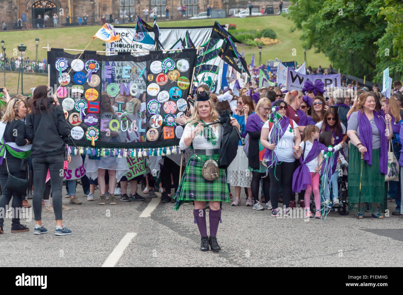 Piper Louise Marshall leads marchers during the Edinburgh Processions ...