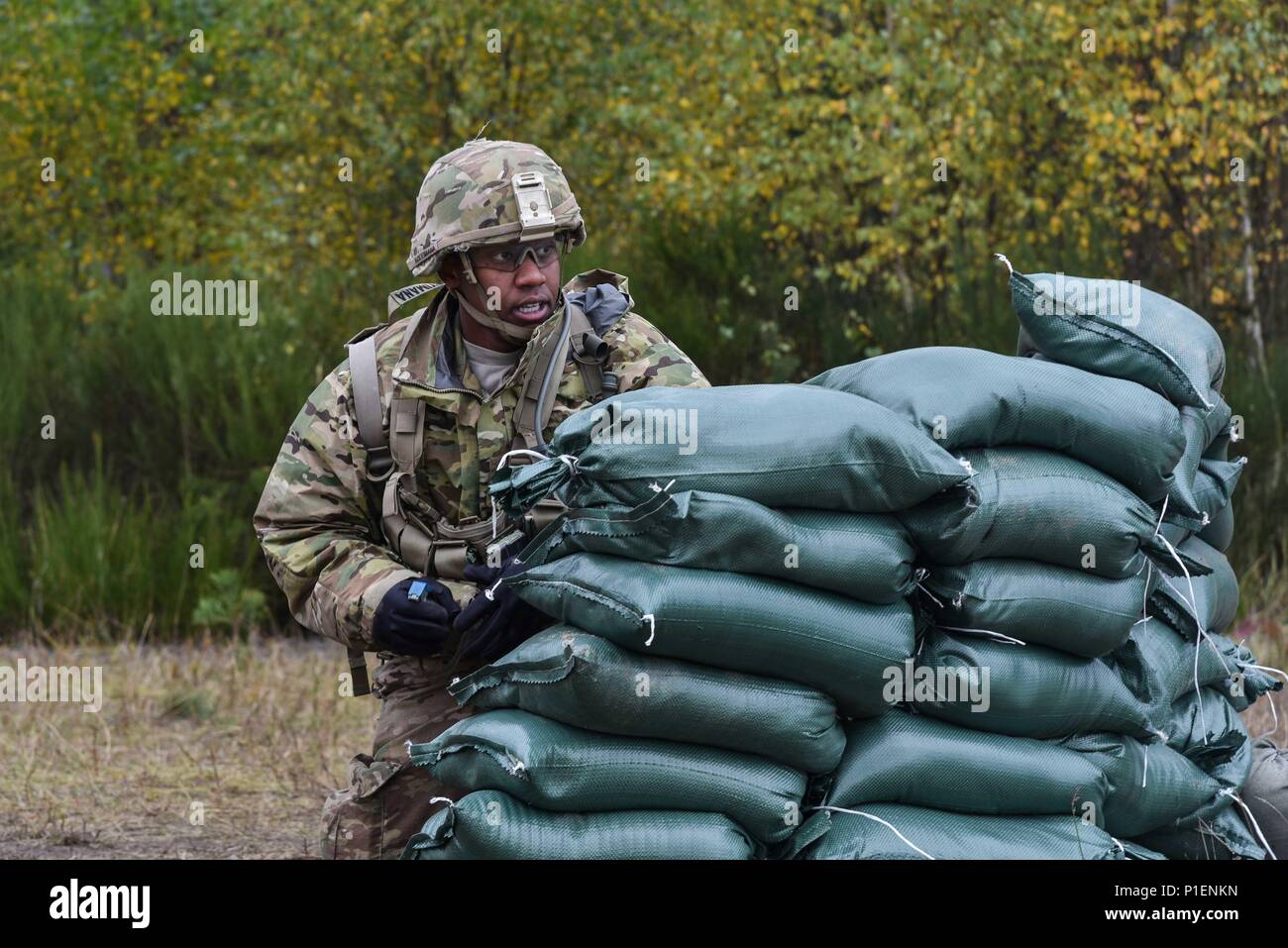 A. U.S. Army infantryman, assigned to 2nd Cavalry Regiment, prepares to ...