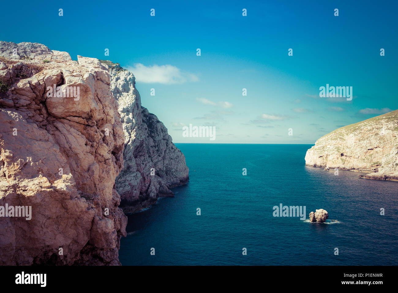 Landscape of sardinian coast with Foradada Island in a sunny day of ...