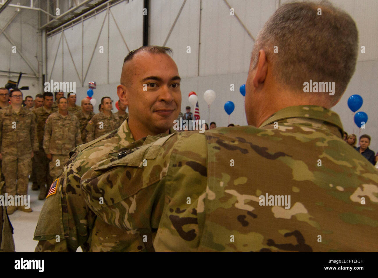 Sgt. Mark Albrecht is pinned on an Army Achievement Medal Oct. 16 at ...