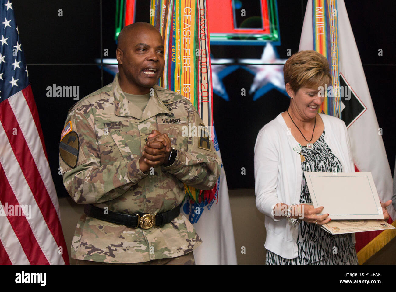 Lt. Gen. Stephen M. Twitty, commander of First Army, leads a round of ...