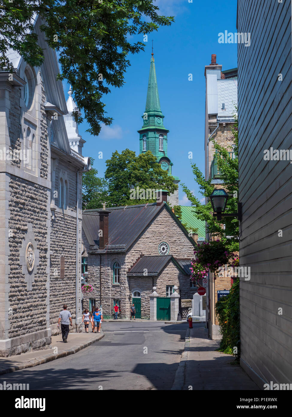 Stone building by Ursuline Chapel with Cathedral of the Holy Trinity ...