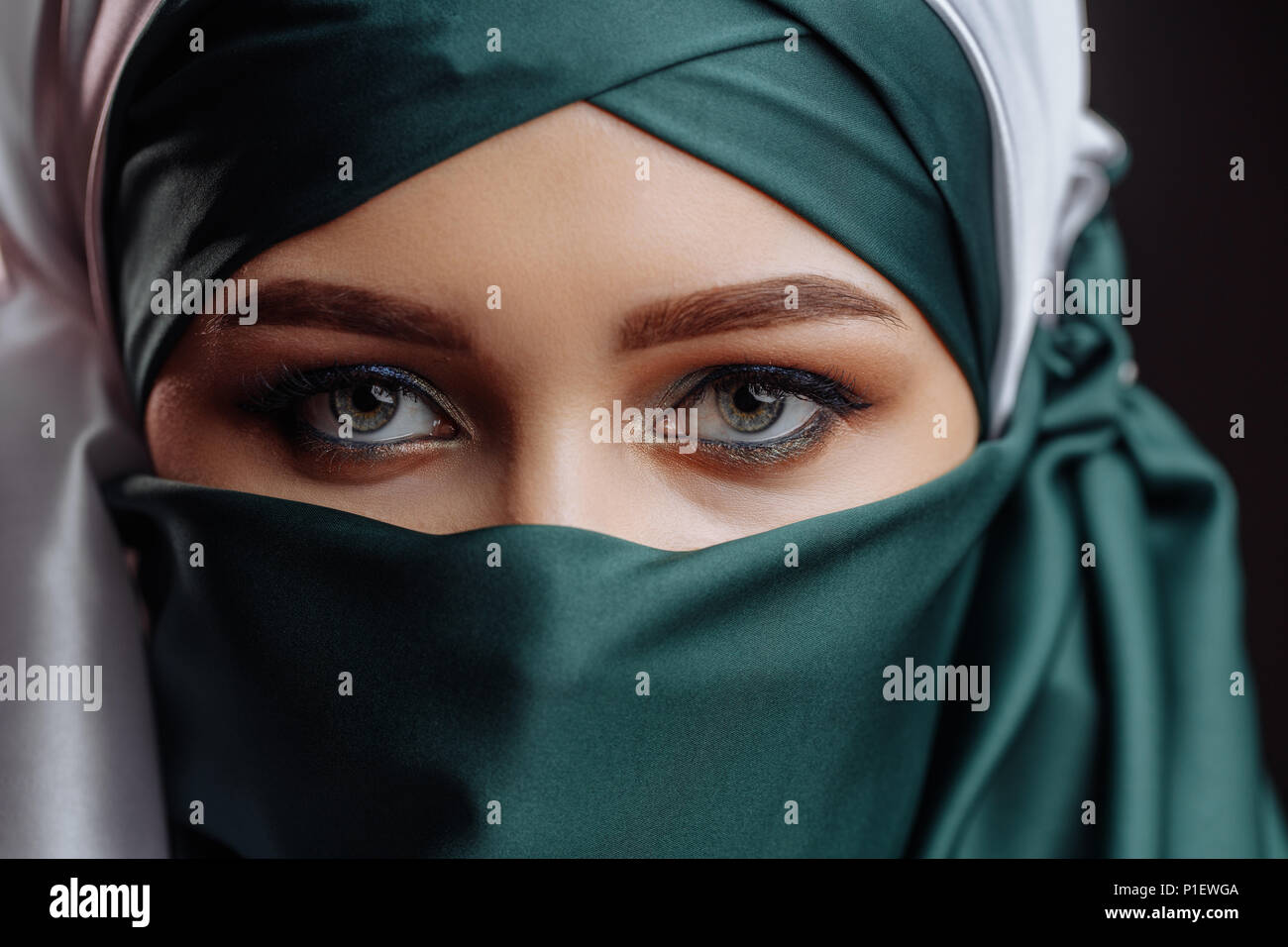 Muslim face with mysterious look Stock Photo - Alamy