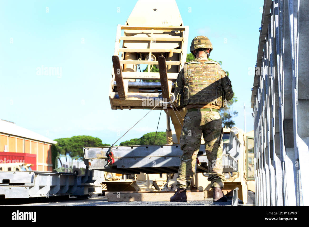 A Soldier from British Army’s 22nd Royal Engineers Regiment gives ...