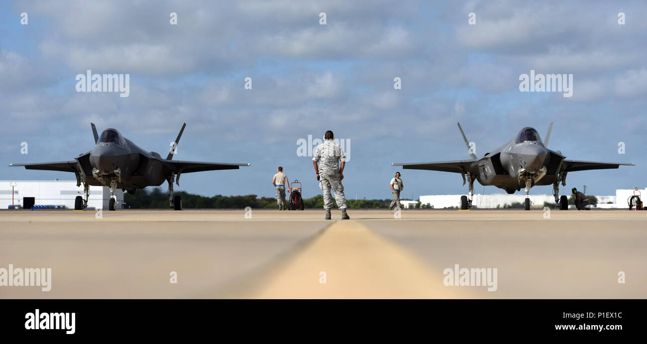 Members of the 33rd Fighter Wing prepare two F-35A Lightning II ...