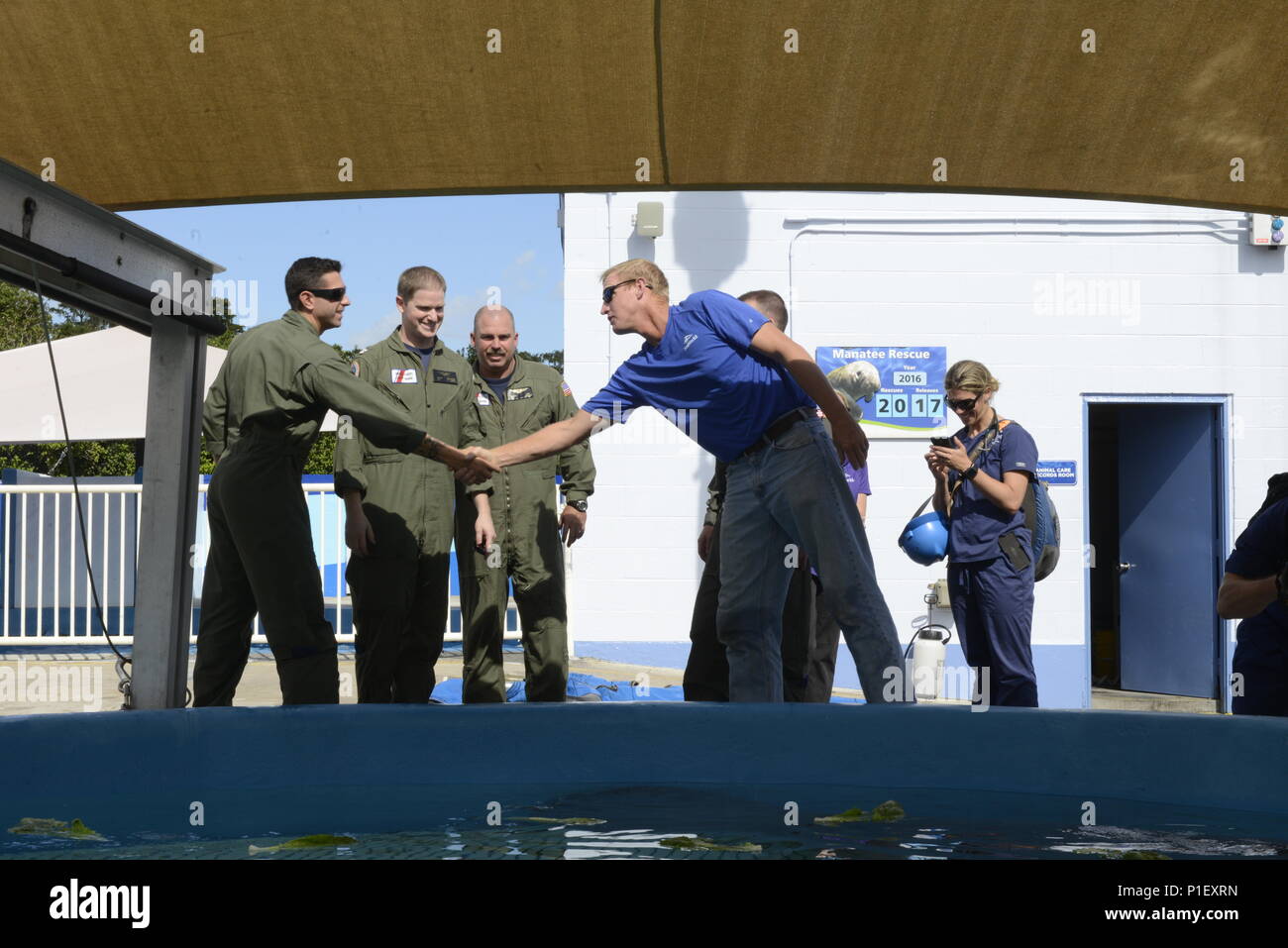 The Coast Guard air crew from Air Station Cape Cod meets with the ...