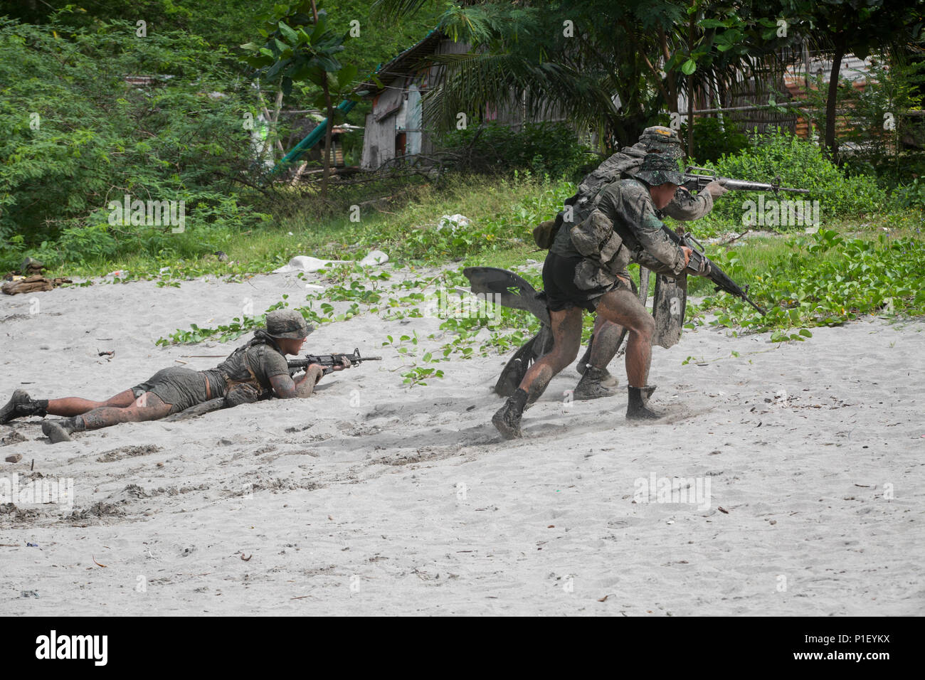 U.S. Marine Lance Cpl. Christopher Gonzalez, a scout swimmer assigned ...