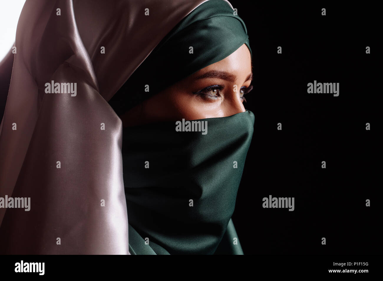 thoughtful Islamic lady. close up side view shot Stock Photo - Alamy