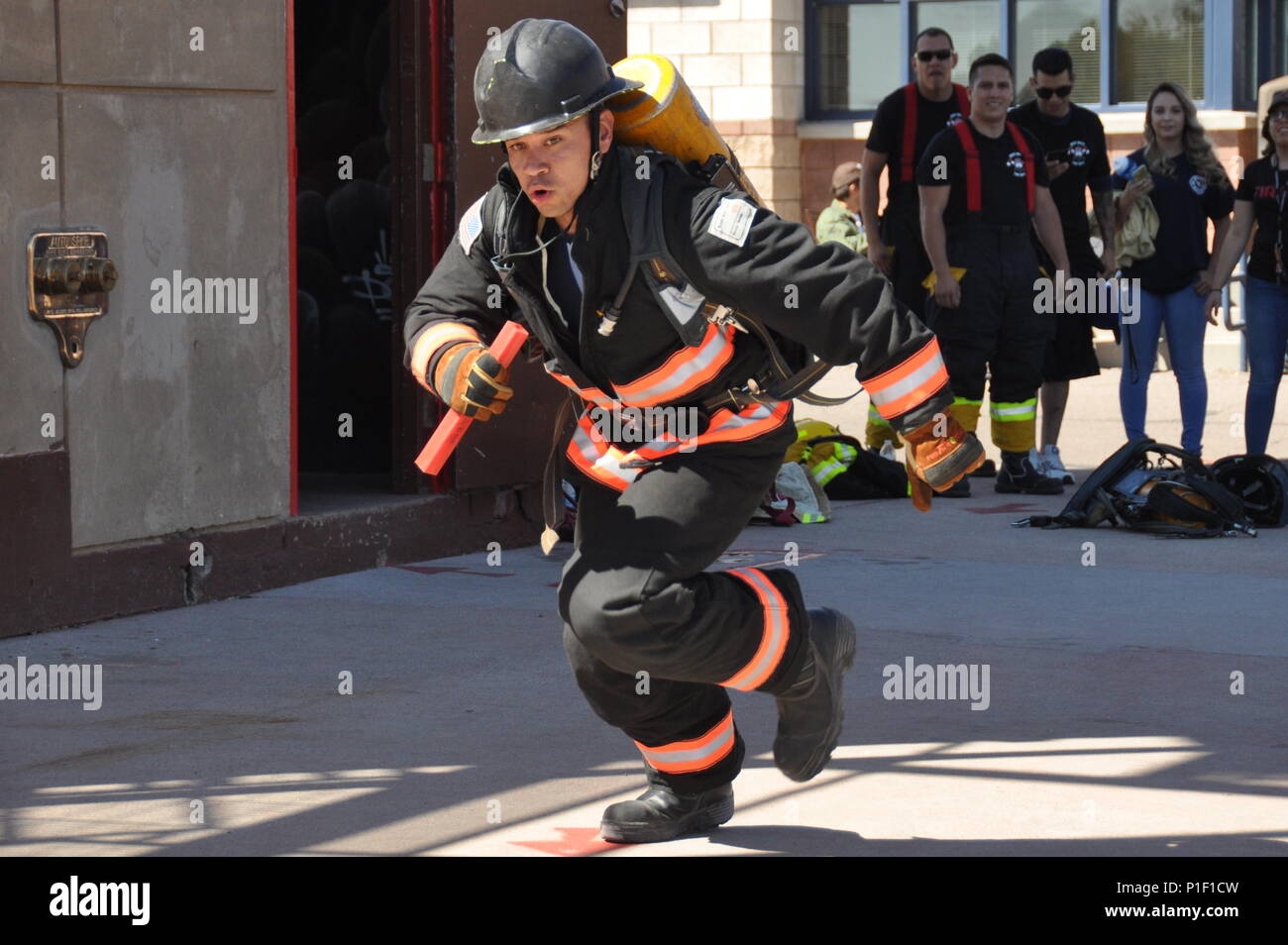 Firefighter Frank Luna, a member of the Fort Bliss Fire Department ...