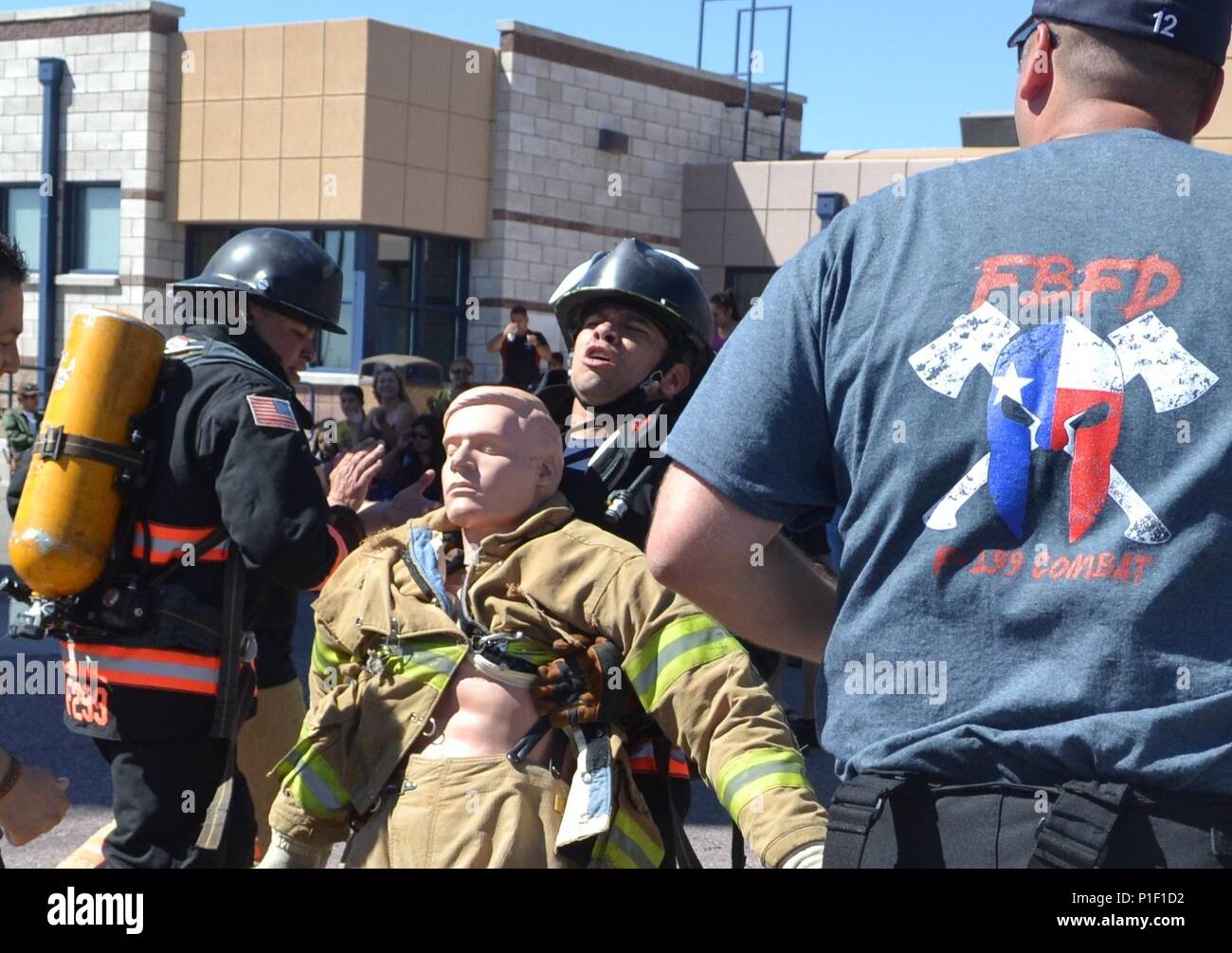 Firefighter Frank Luna, a member of the Fort Bliss Fire Department ...