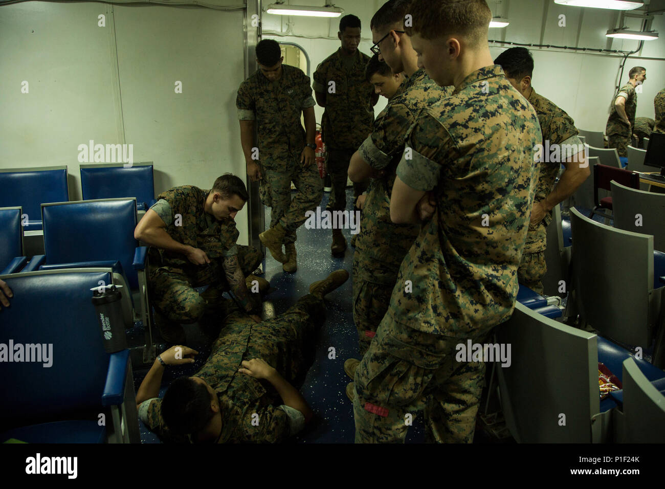 U.S. Navy Petty Officer 3rd Class Timothy Pryor, a hospital corpsman ...