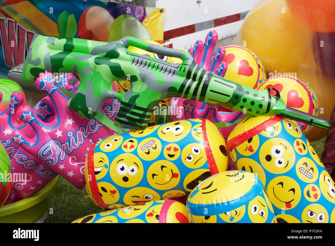 Wyndmoor, PA, USA - June 8, 2018: Inflatable machine guns are among the ...