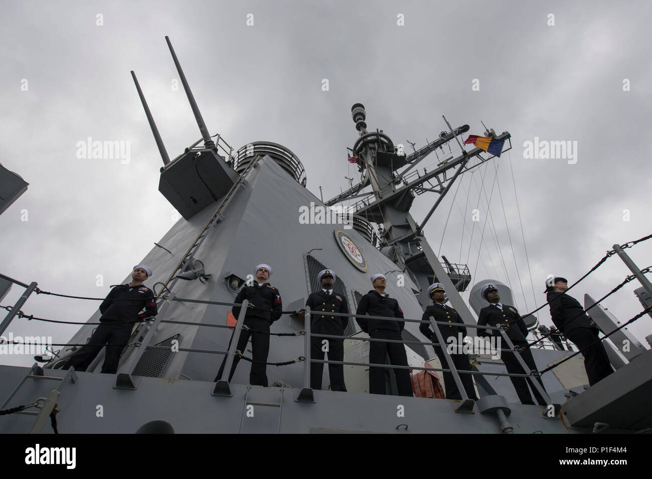 Sailors aboard USS Carney (DDG 64), an Arleigh Burke-class guided ...