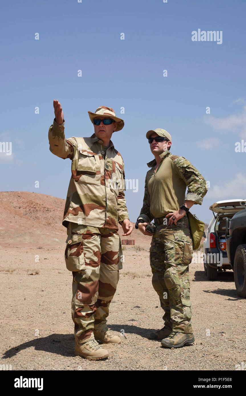 U.S. Navy and French Explosive Ordnance Disposal (EOD) personnel ...