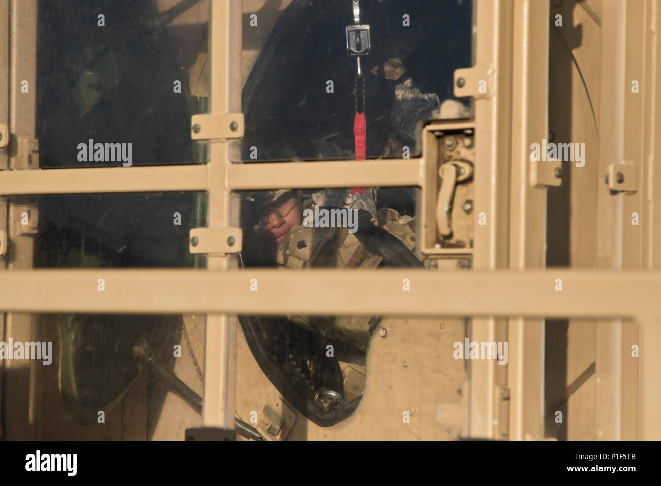 Soldiers of the 316th Sustainment Command (Expeditionary) egress from a ...