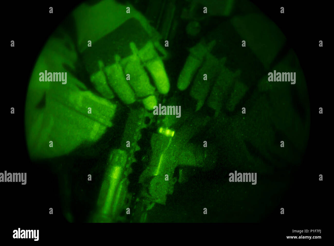 A U.S. Marine Special Operations Command personnel holds a weapon while ...