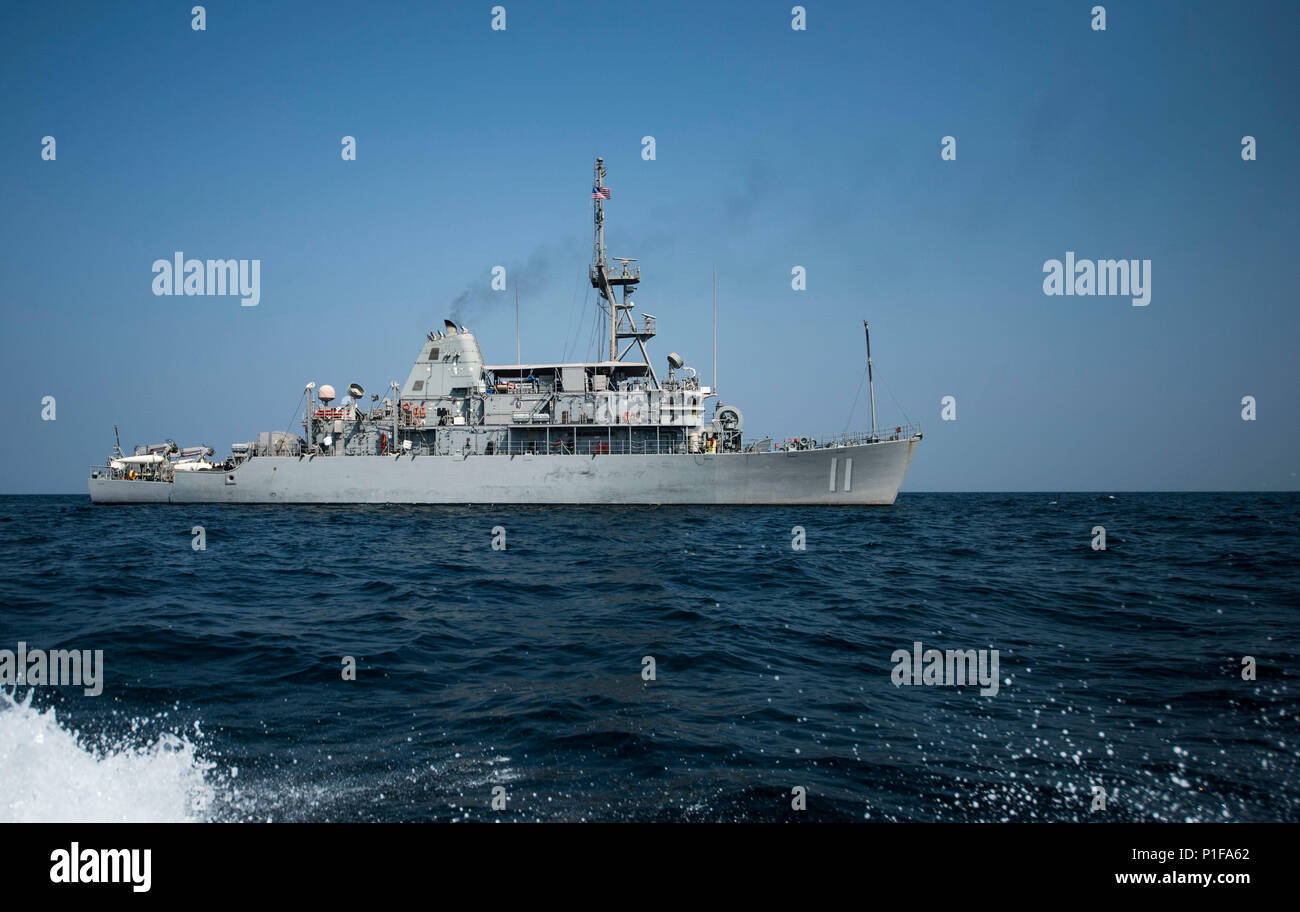 USS Gladiator (MCM-11) sailed in formation with allied vessels during ...