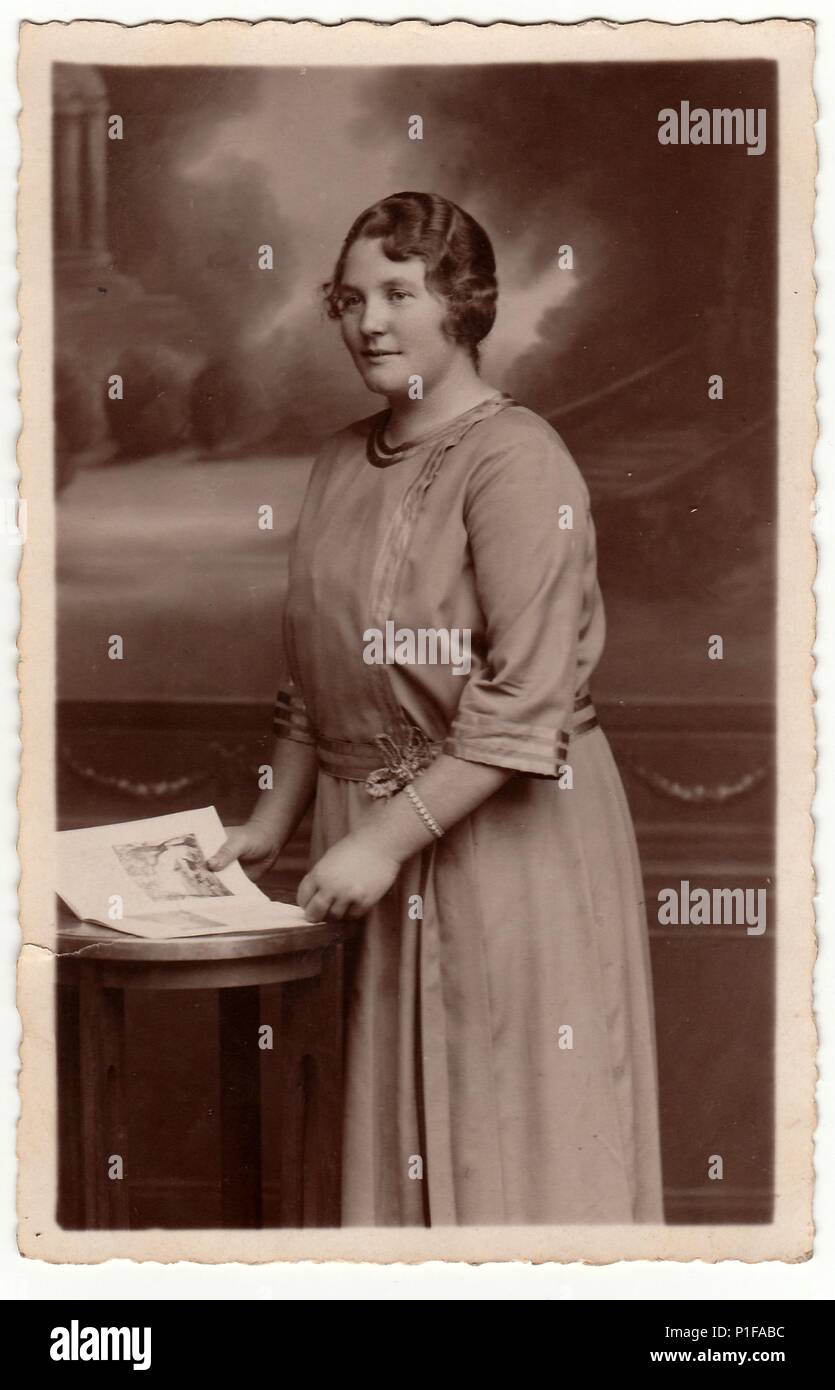 EILENBURG, GERMANY - CIRCA 1920s: Vintage photo shows mature woman ...