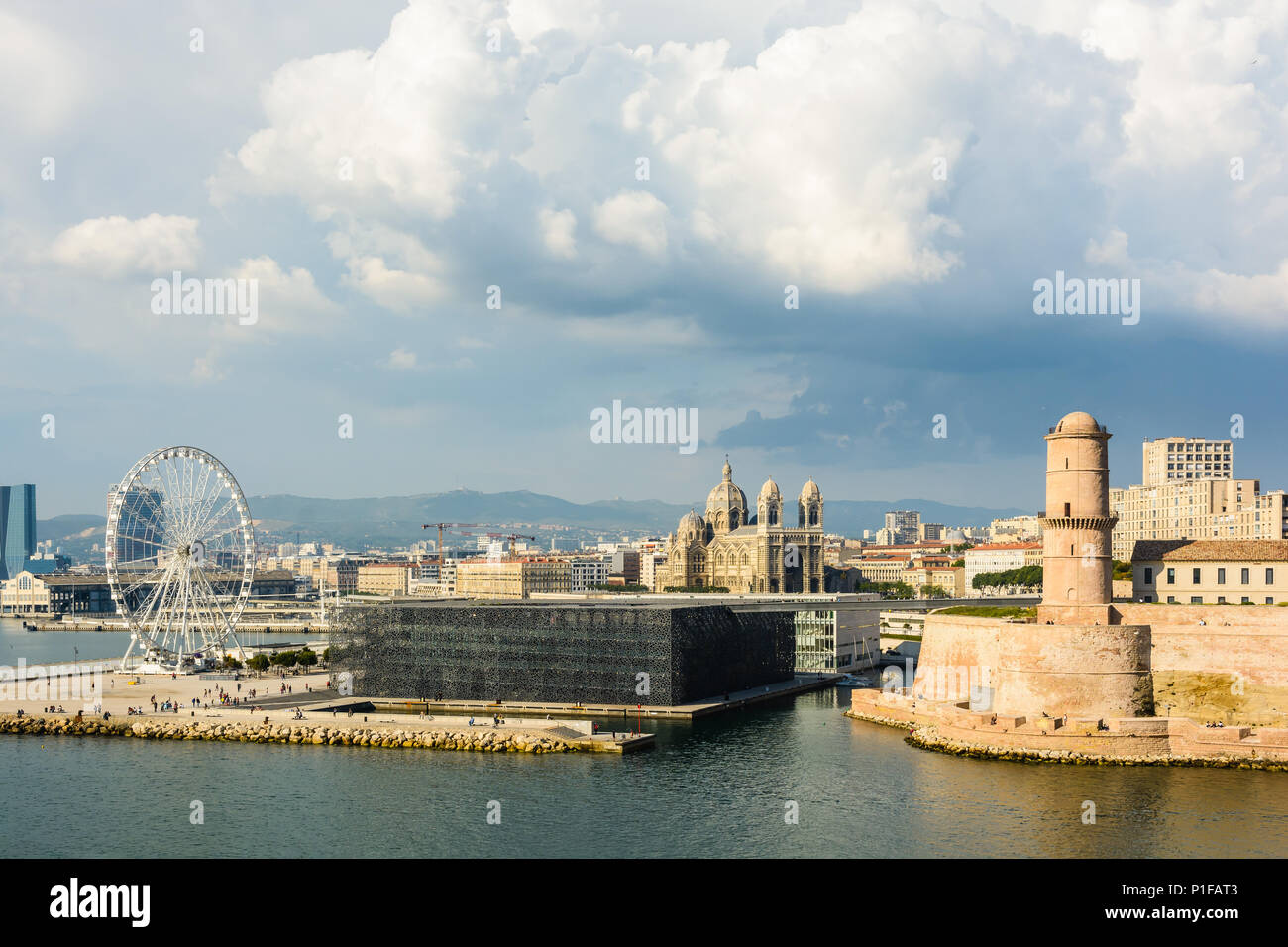 Saint Jean fort in Marseille under a stormy sky with the MuCEM and ...