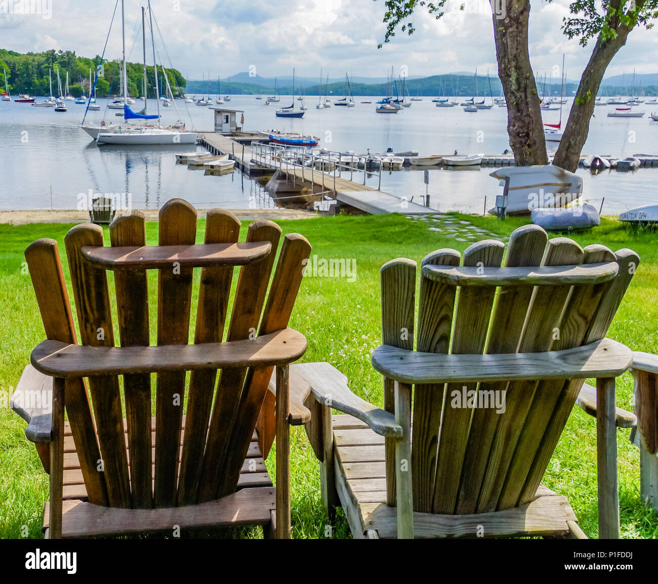 Adirondack chairs dock hi-res stock photography and images - Alamy