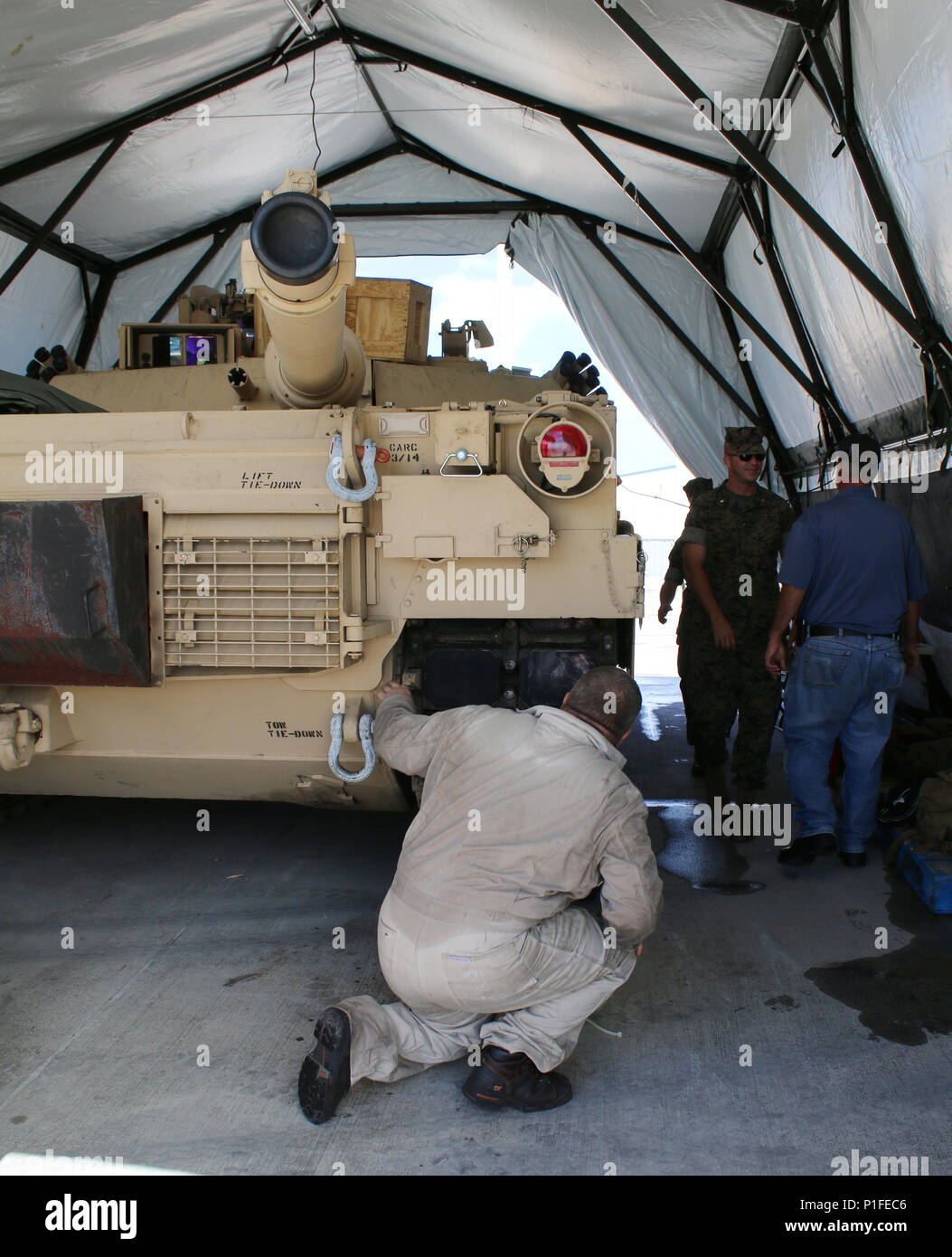 SANTA RITA, Guam (Oct. 13, 2016) -- A Marine Corps tank sits inside a ...