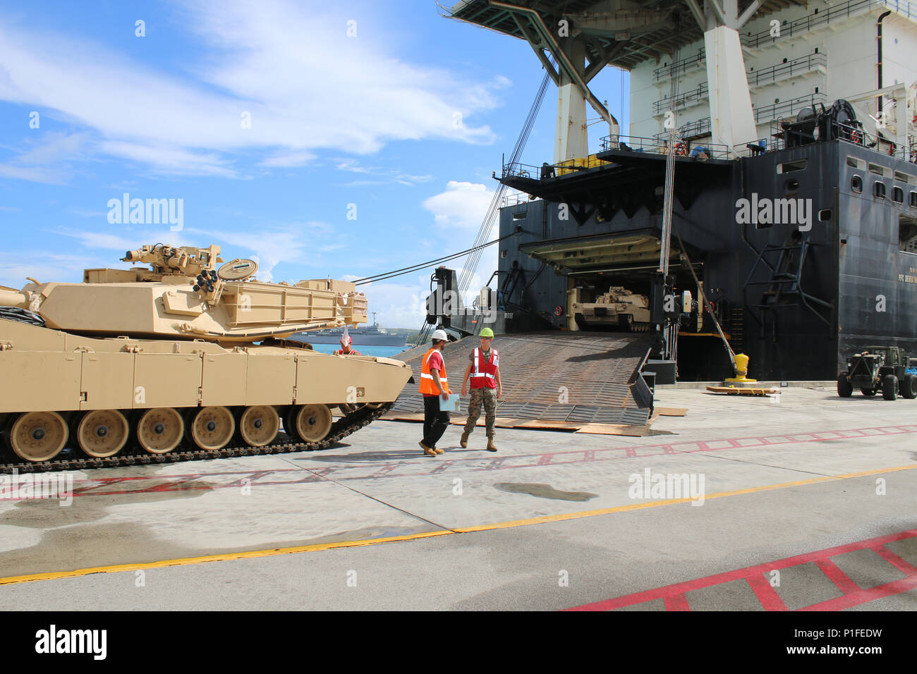 SANTA RITA, Guam (Oct. 28, 2016) -- A Marine Corps tank sits adjacent ...