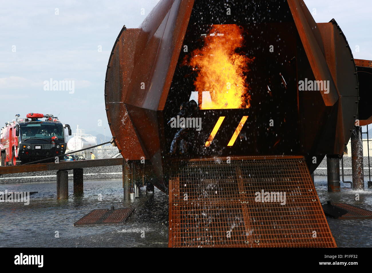 U.S Marines with Aircraft Rescue Fire Fighting (ARFF) conduct training ...