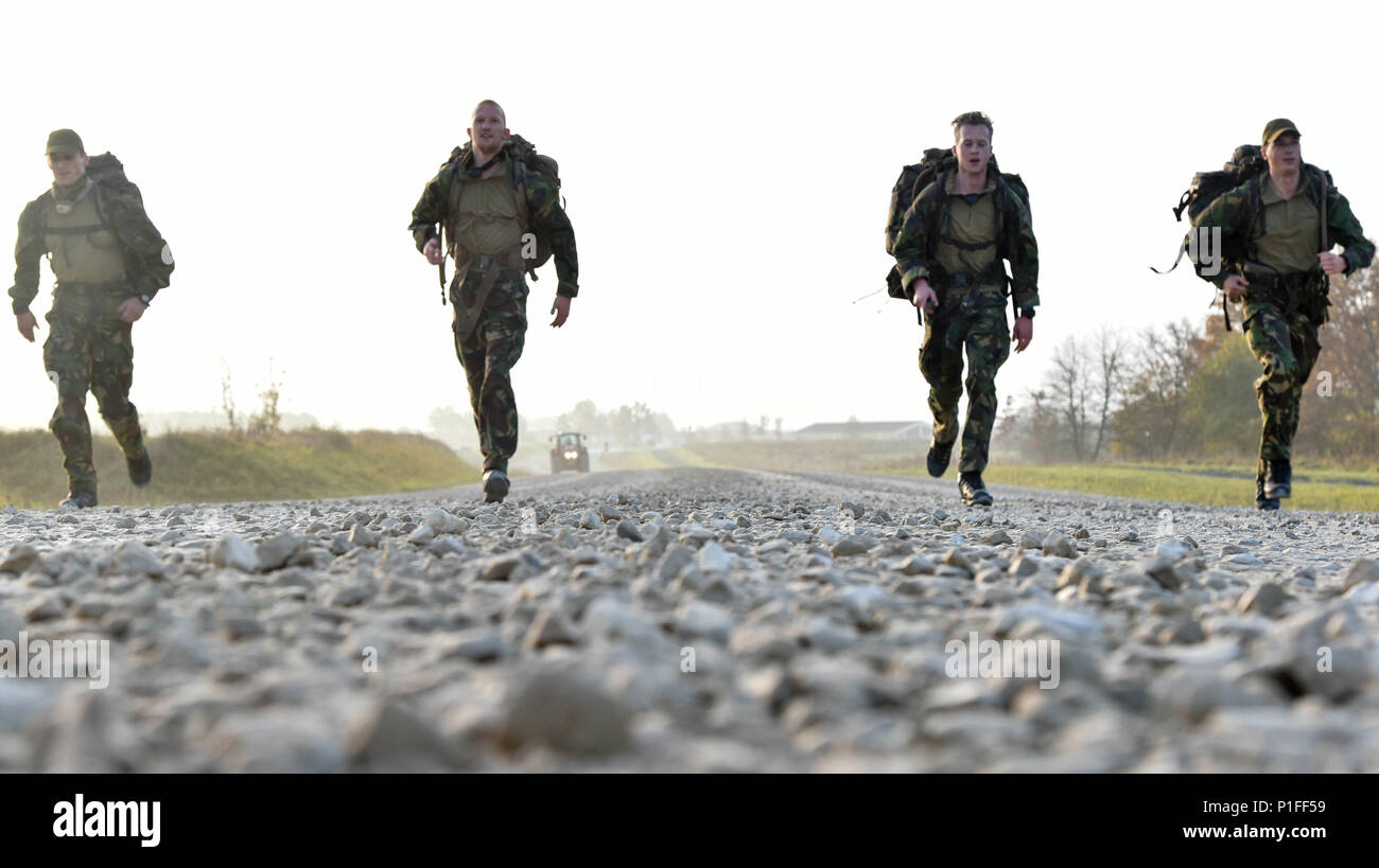 Dutch soldiers participate in the 12 mile Ruck March event as part of ...