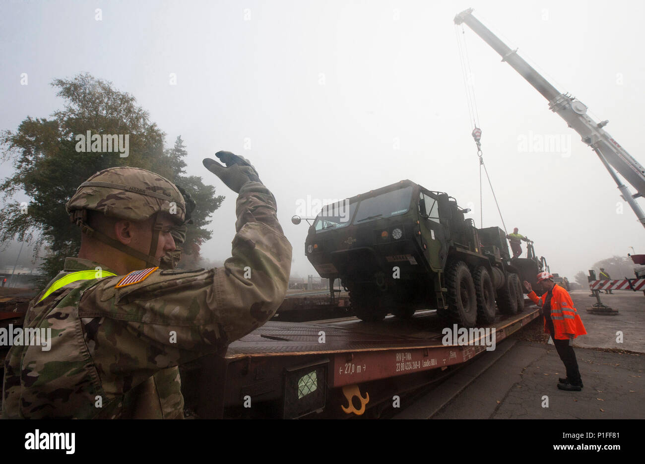 U.S. Army Sergeant Joseph Harris (left), with the 5th Battalion, 7th ...