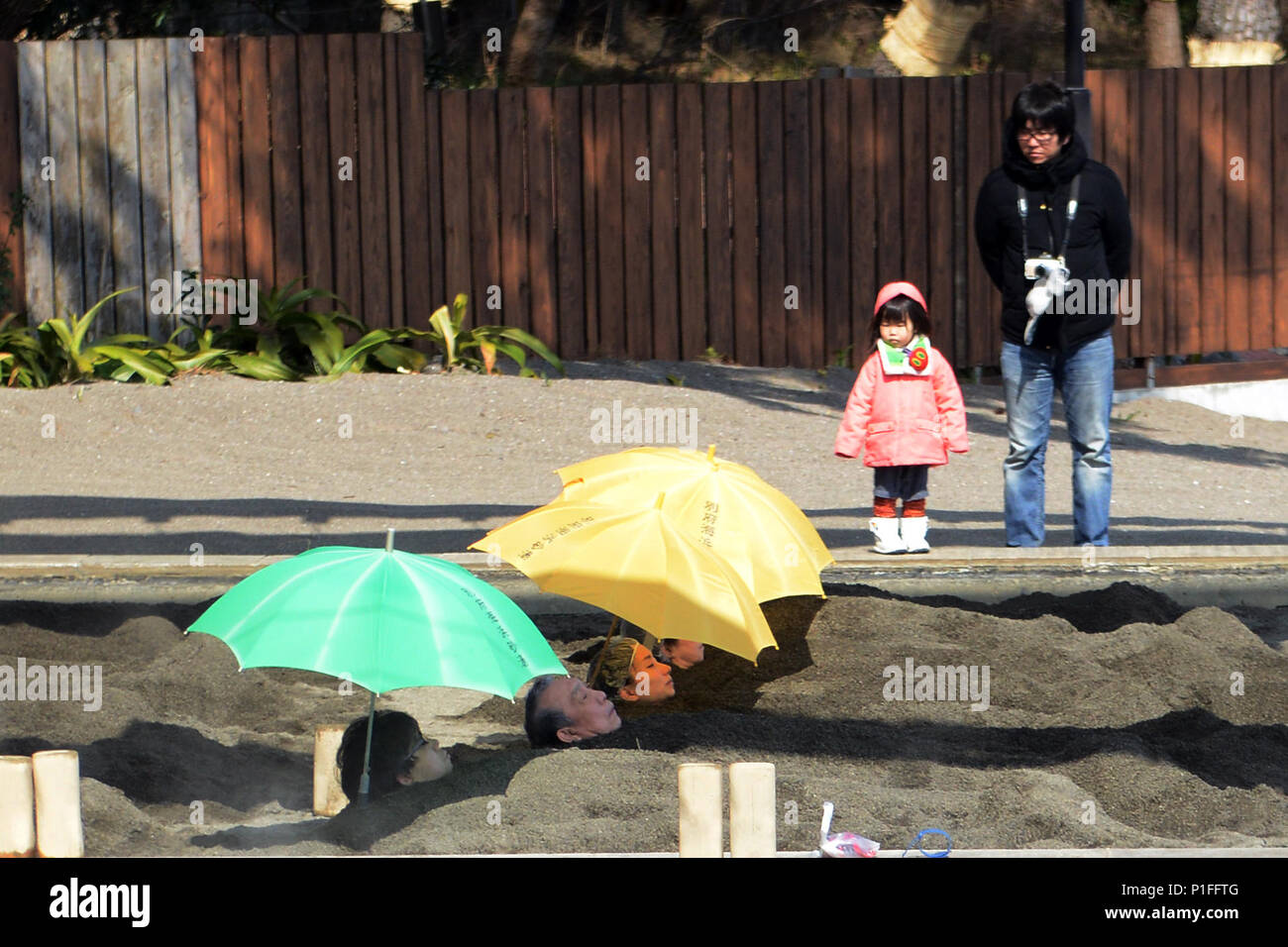 A unique sand bath at Kamegawa onsen by the ocean at Beppu Stock Photo ...