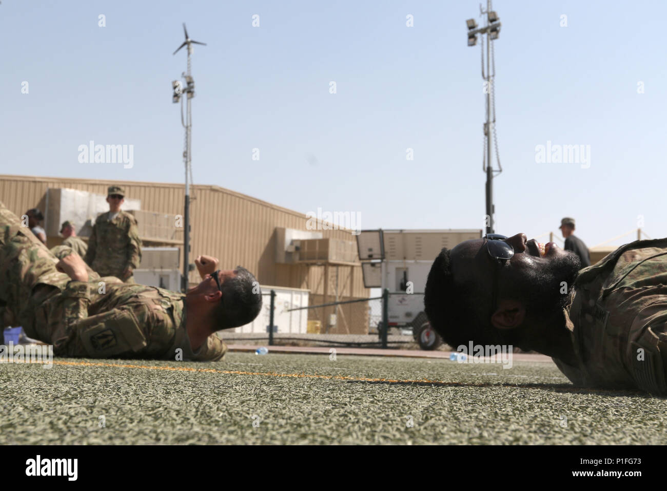 Soldiers back crawl under the hot Middle Eastern midday sun for the NCO ...
