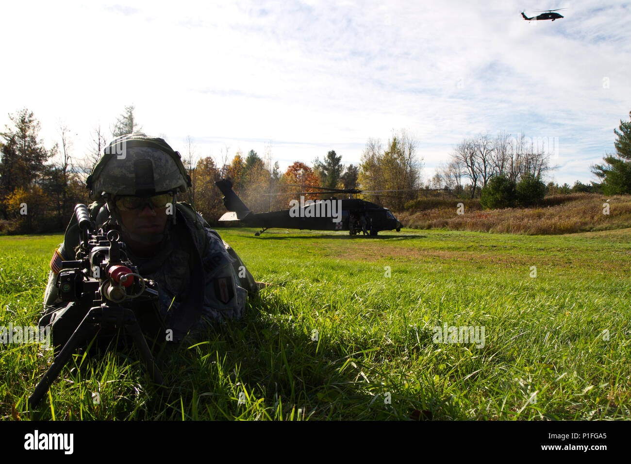 A Soldier from 94th Military Police Company pulls security while a ...