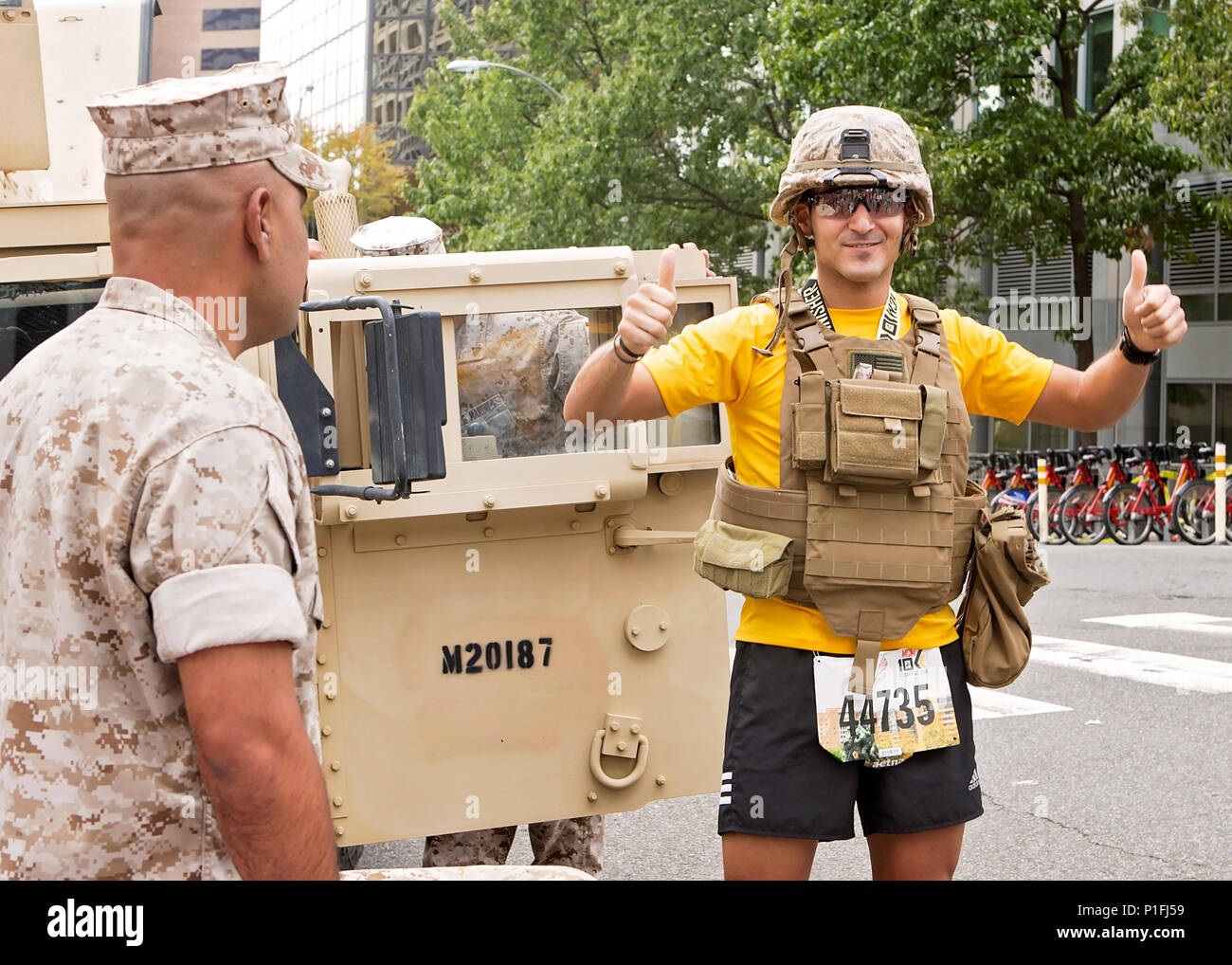 Runner Franco Daza Jaller poses for a photo after completing the 10K ...