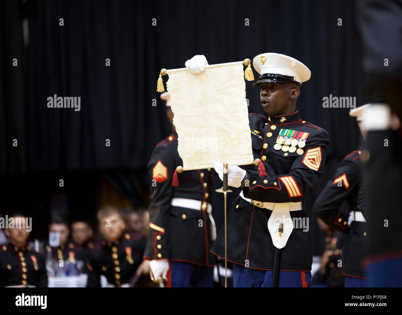 U.S. Marine Corps Gunnery Sgt. Avias Jones reads General John A ...
