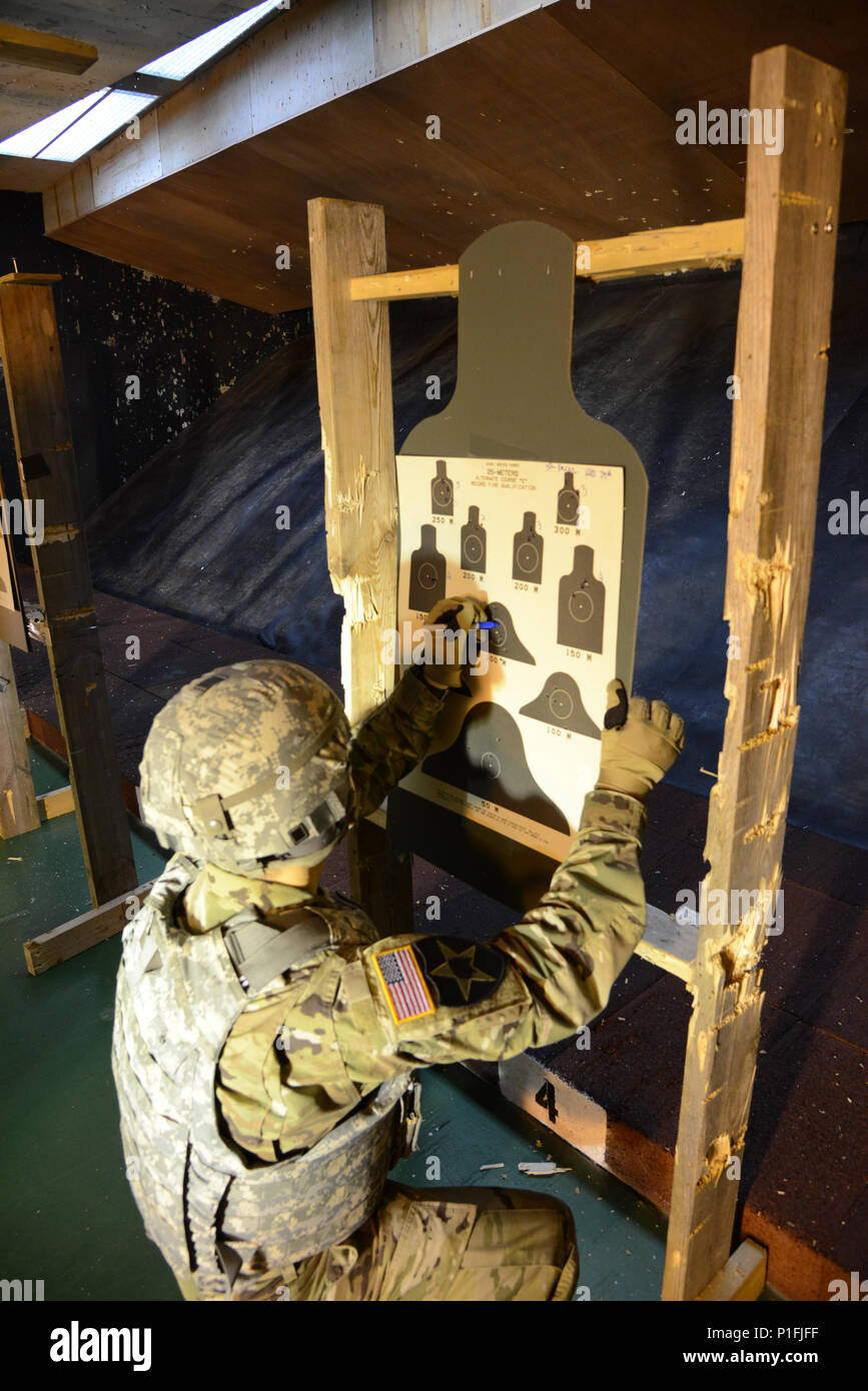 U.S. Army Sgt. Alexi Hernandez, range safety Officer , circles and ...