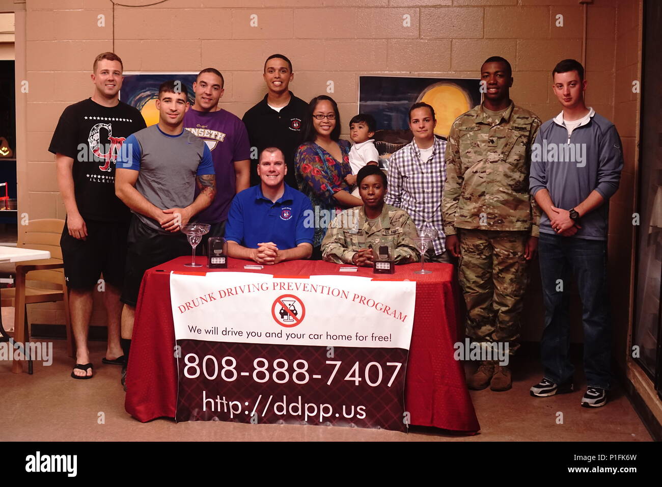 Volunteers with the Drunk Driving Prevention Program pose for a group ...