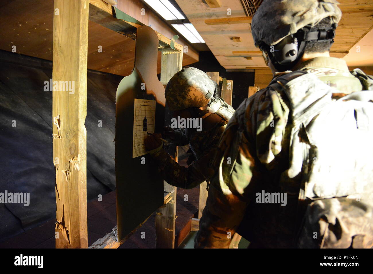 U.S. Army Staff Sgt. Astin P. Muse circles the impacts from Sgt ...