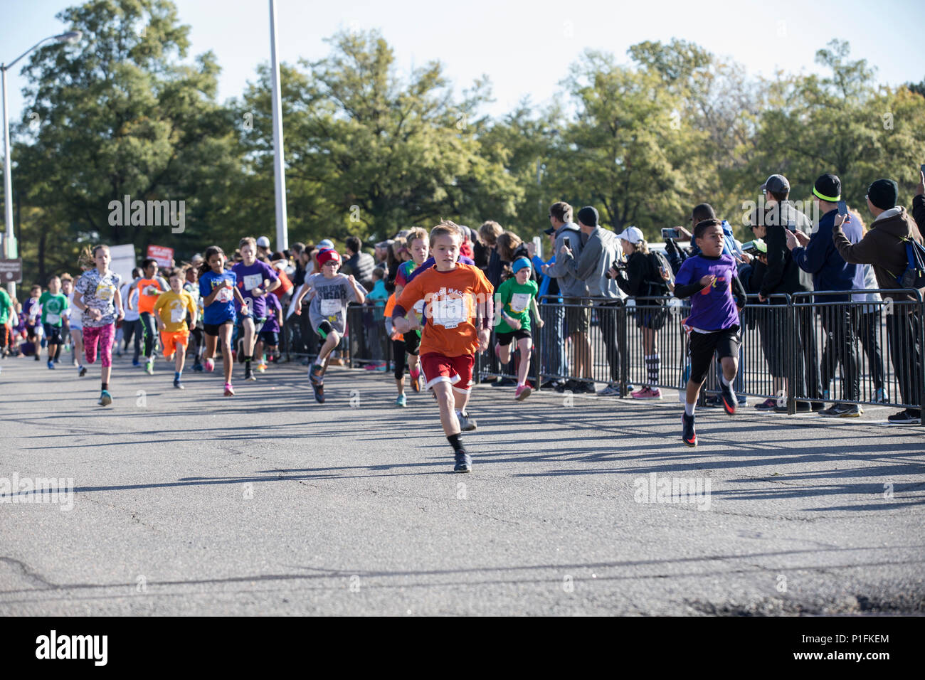 Children run at the beginning of the 1 mile Kid's Run, hosted by the ...