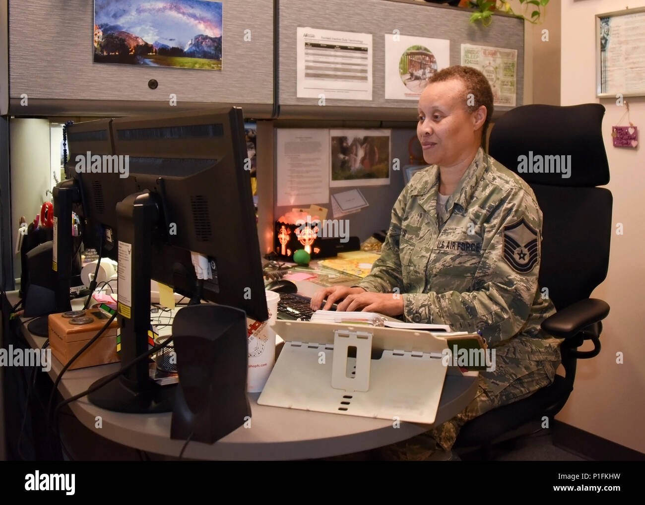 Master Sgt. Angela Keys is at her desk completing required reports Oct ...