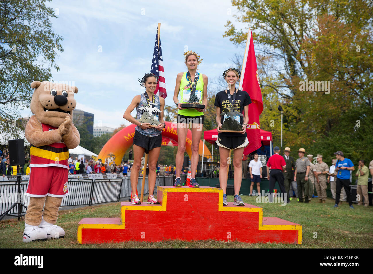 The top three female finishers of the 41st Marine Corps Marathon 26.2 ...