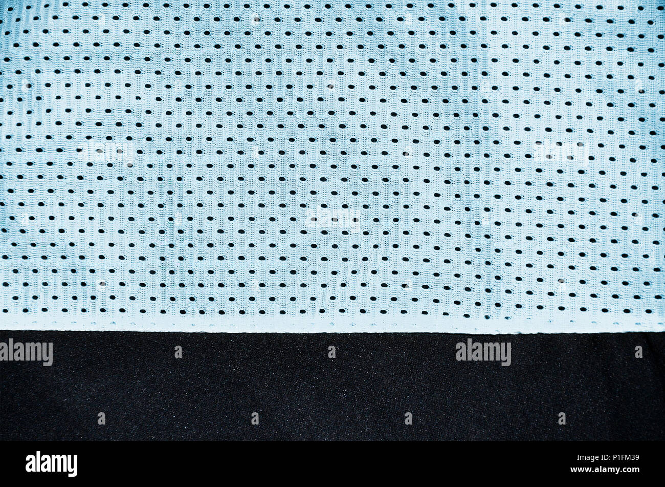 Blue sport clothing fabric texture background. Top view of light blue ...