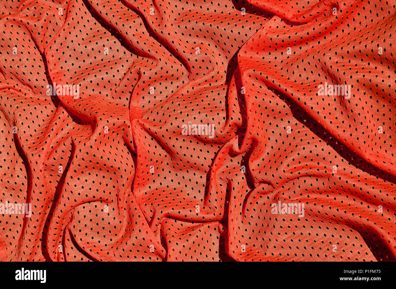 Sport clothing fabric texture background. Top view of red polyester ...