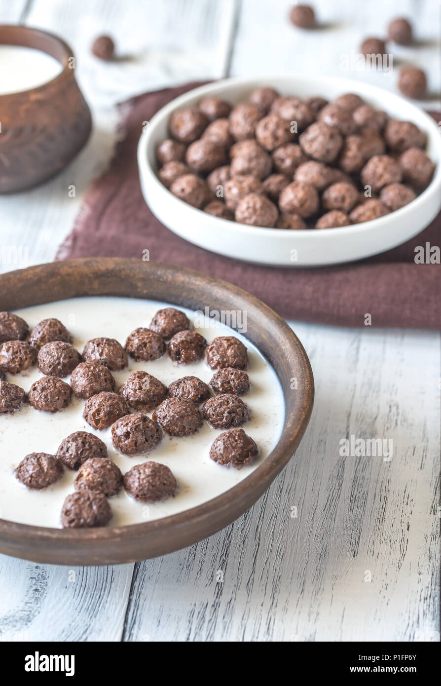 Bowl of chocolate corn balls with milk Stock Photo - Alamy
