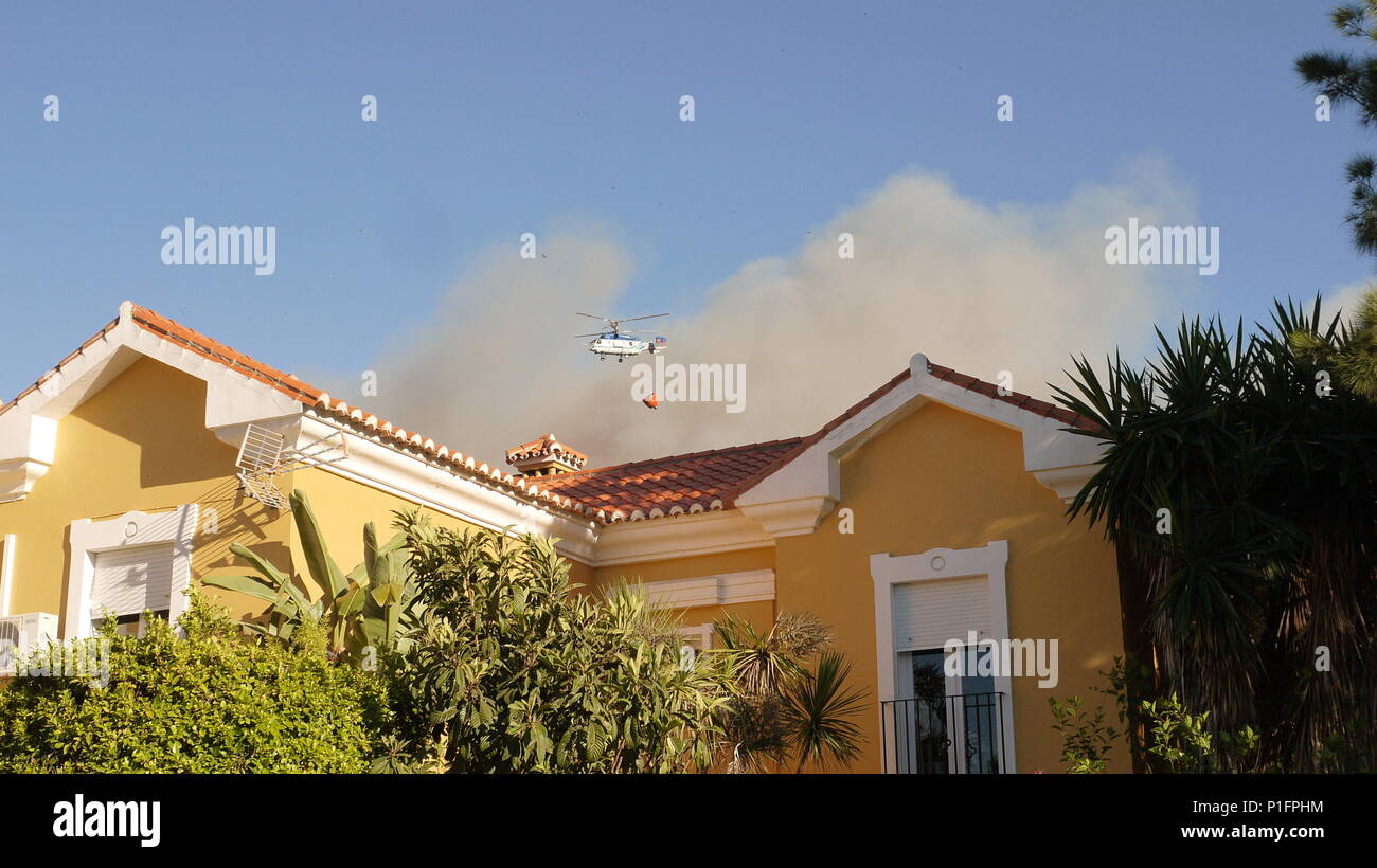 A smokey bush fire in southern Spain Stock Photo - Alamy