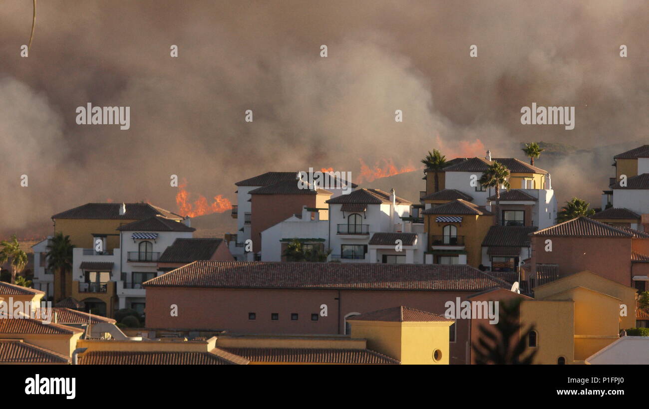 A smokey bush fire in southern Spain Stock Photo - Alamy