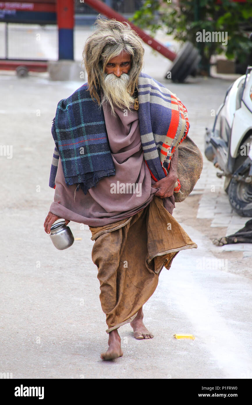 Barefoot homeless man hi-res stock photography and images - Alamy