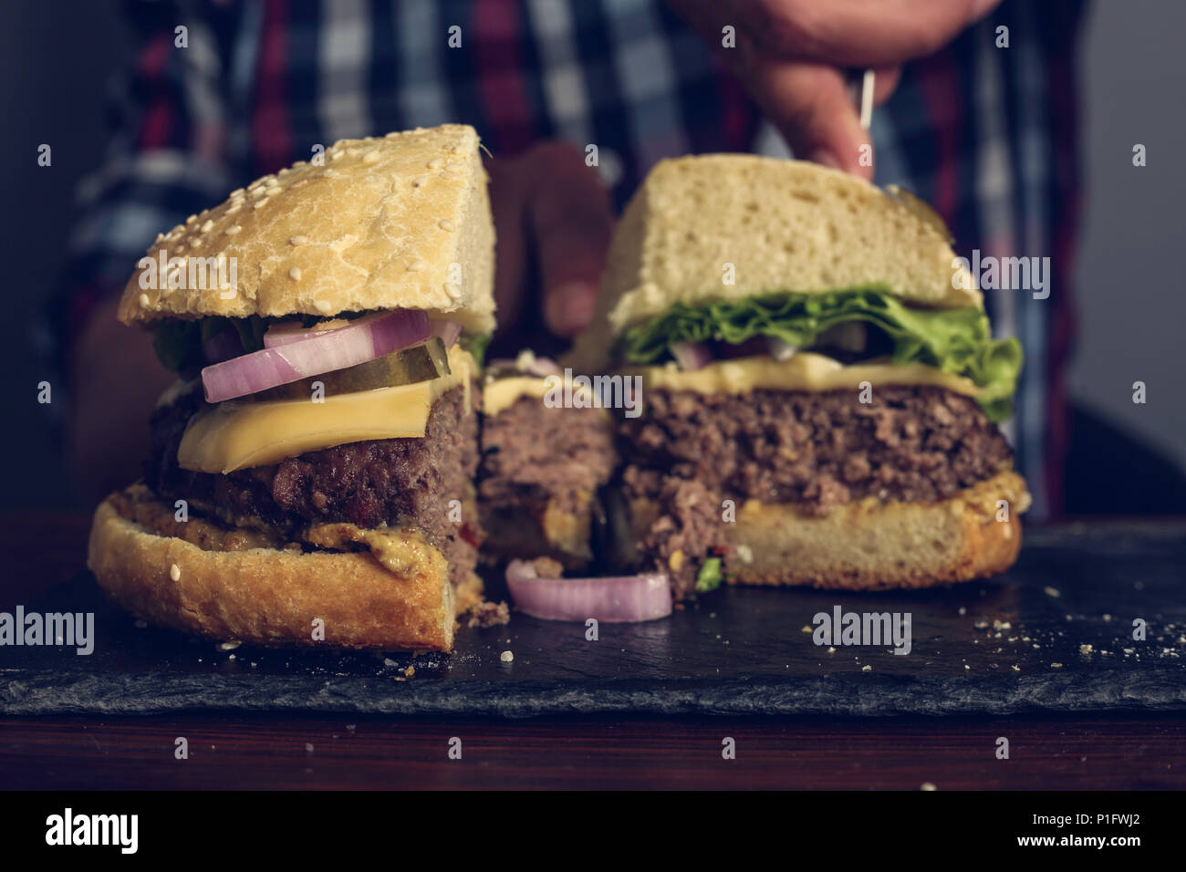 Handsome man eating fork knife hi-res stock photography and images - Alamy