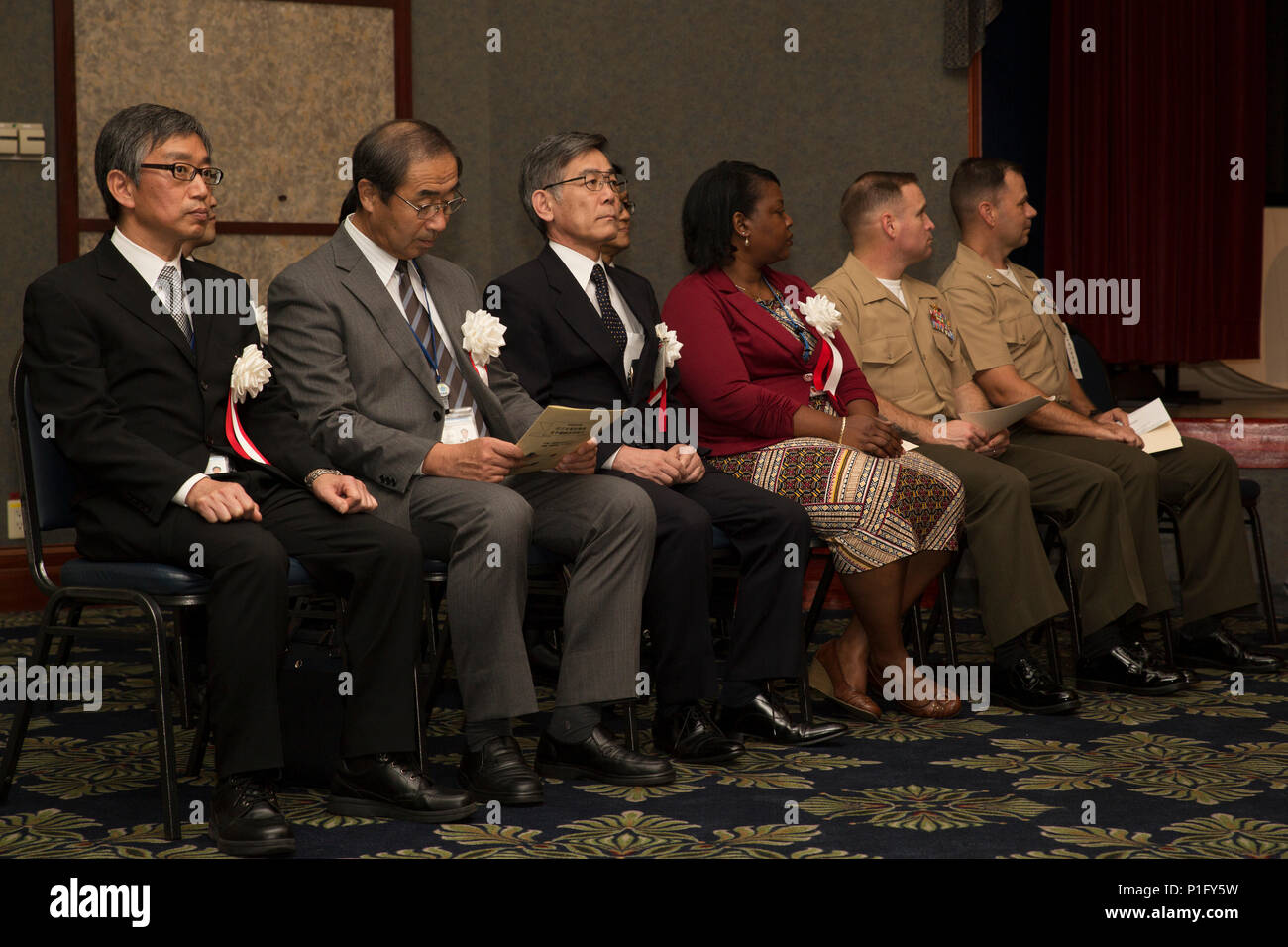 Master Labor Contract and Indirect Hire Assignment officials, left, and ...