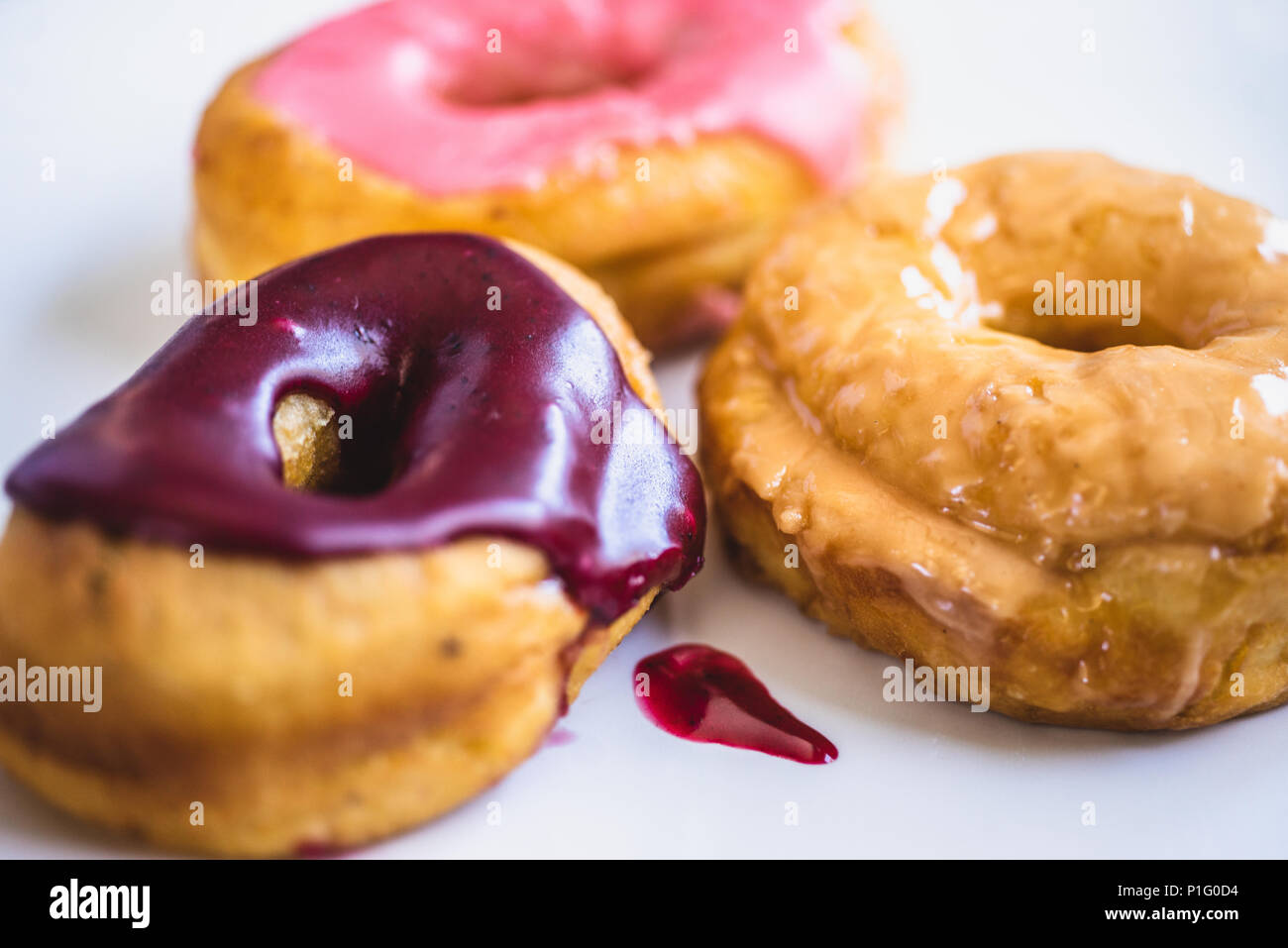 closeup of doughnuts on white background Stock Photo - Alamy