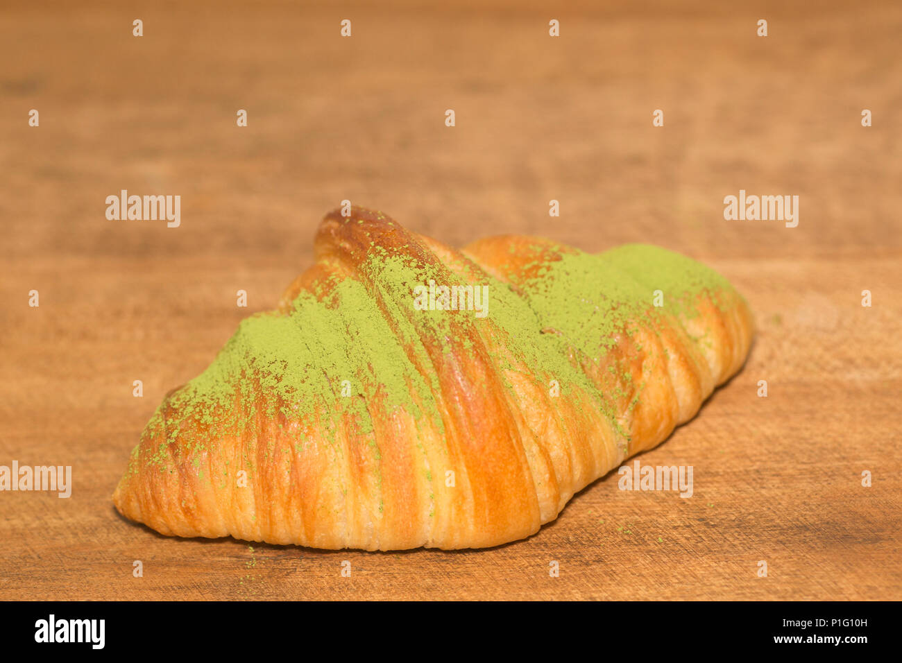 Fresh matcha croissant Stock Photo - Alamy